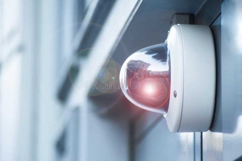 Security Camera on Modern Building with Flare Stock Photo - Image of ...