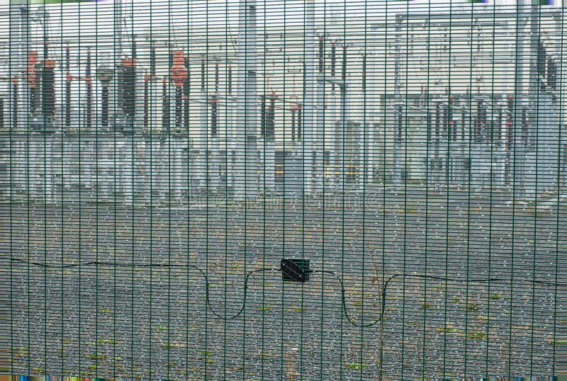 Closeup of a Security Fence Around a Power Plant Stock Photo - Image of ...