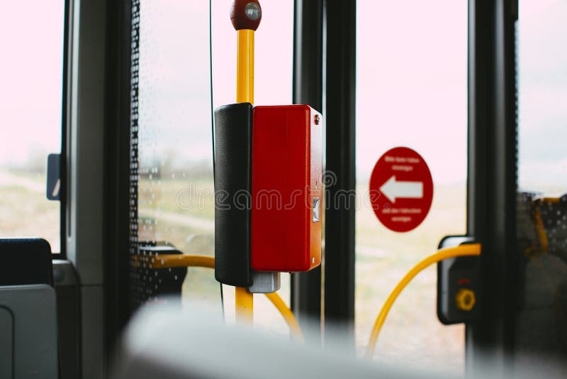 Closeup Selective Focus Shot of a Bus Interior with Signs and Equipment ...