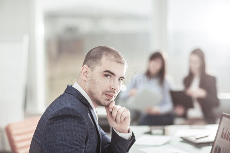 Senior Manager at the Workplace on the Background of Business Team ...