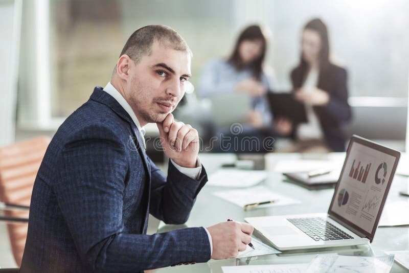 Senior Manager at the Workplace on the Background of Business Team ...