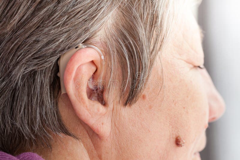 Closeup Senior Woman Using Hearing Aid Stock Image - Image of close ... Closeup Senior Woman Using Hearing Aid Stock Image - Image of close ...