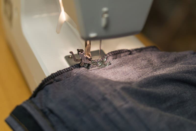 Closeup of Sewing Machine Stitching Trousers Home. Stock Image - Image ...
