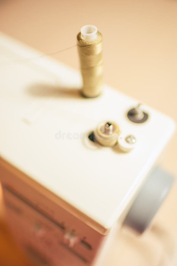 Closeup Sewing Machine with Thread Spool on Rod and on Winder Stock ...