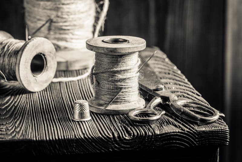 Closeup of Sewing Table with Scissors and Threads Stock Image - Image ...