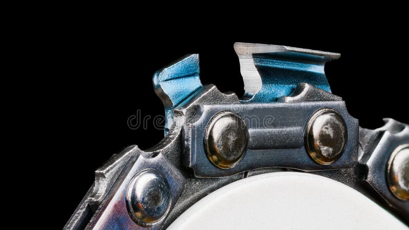 Closeup of Sharp Steel Tooth on Saw Chain Link Joined by Metal Rivets ...