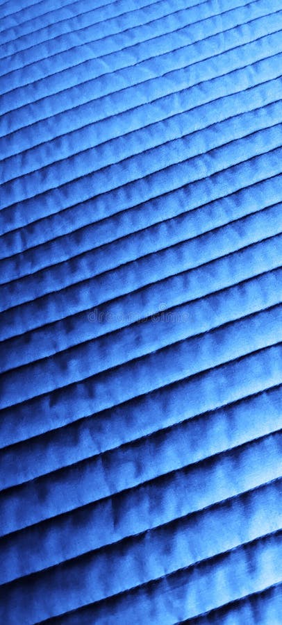 A Closeup of a Shiny Blue Bed Spread. Stock Image - Image of graphic ...