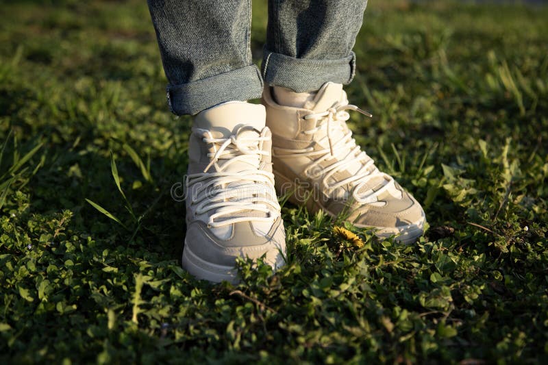 Closeup on Shoe with Rolled Up Jeans Stock Photo - Image of nature ...