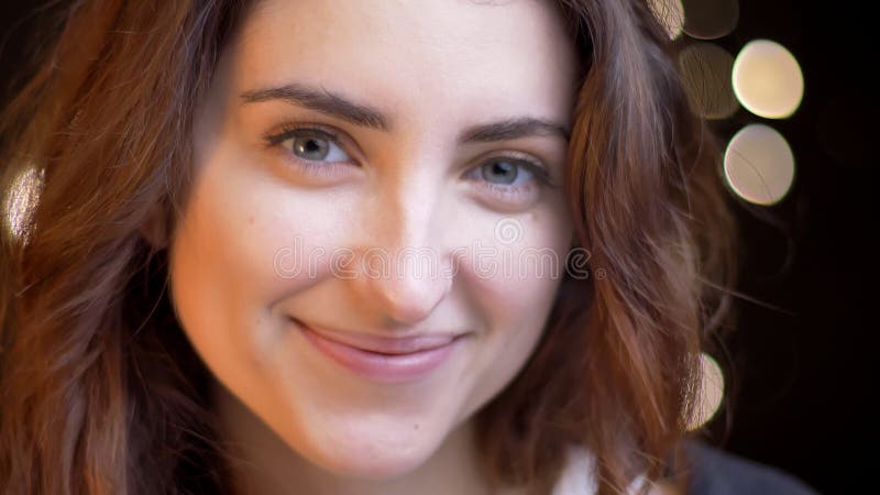 Closeup Shoot Of Young Pretty Caucasian Female Watching Tv And Being