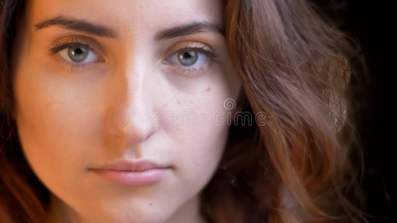 Closeup Shoot Of Young Pretty Caucasian Female With Brunette Curly Hair