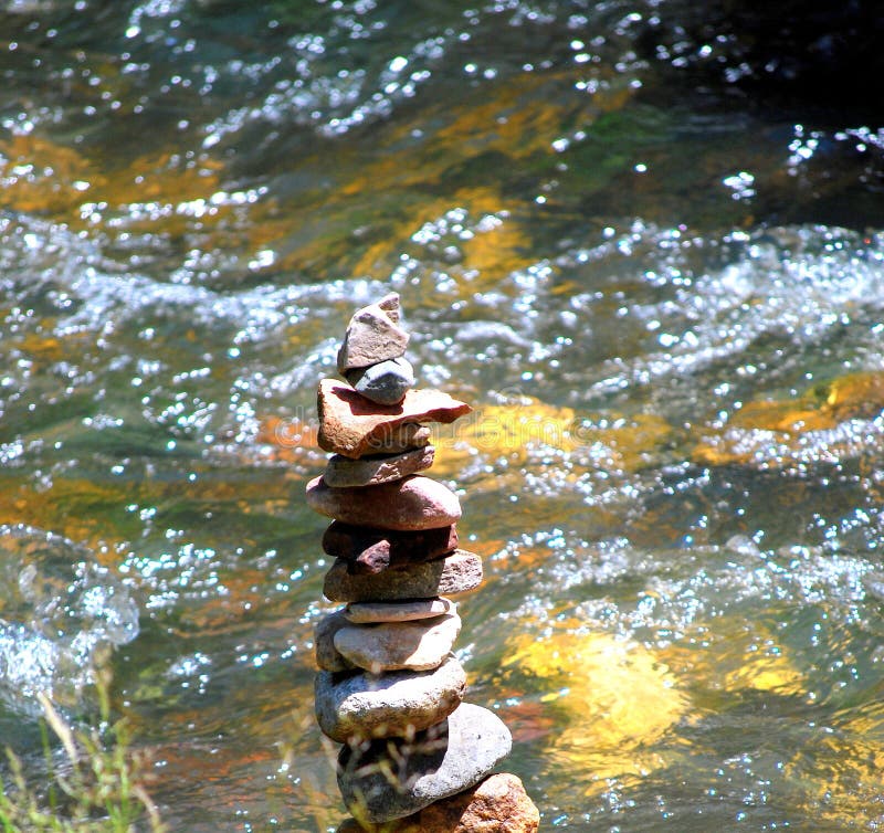 Closeup Shot of the Balanced Stack of Pebbles on the River Background ...