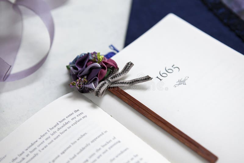 Closeup Shot of a Beautiful Decorative Bookmark on an Open Book Stock ...