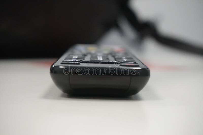 Closeup Shot of a Black Remote Control on a Table Stock Image - Image ...