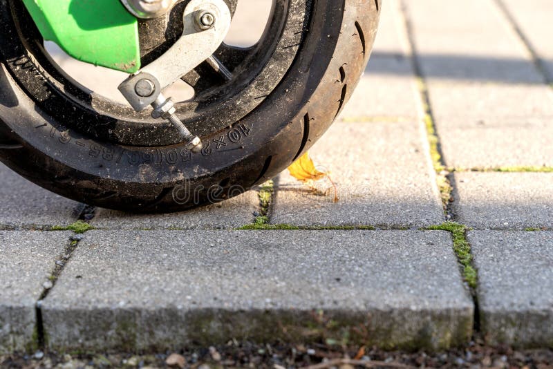 Closeup Shot of Black Wheel on Ground Stock Photo - Image of shiny ...