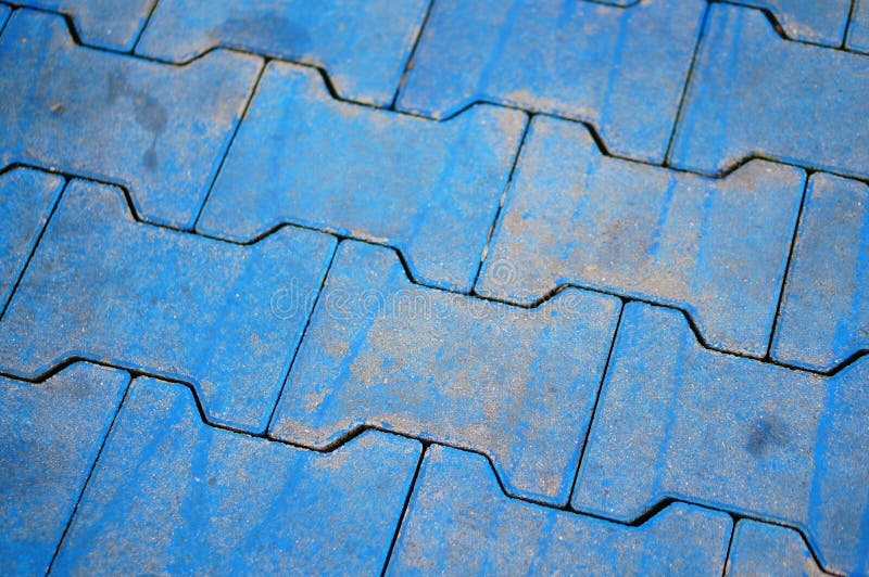 Closeup Shot of Blue Interlocking Paver Blocks Stock Image - Image of ...