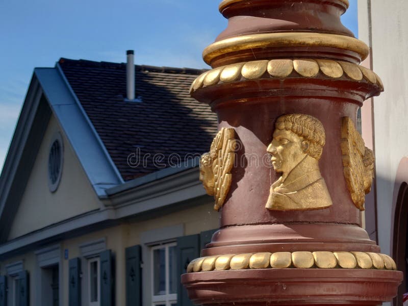 Closeup Shot of a Brown Column with Golden Decorations in Basel ...
