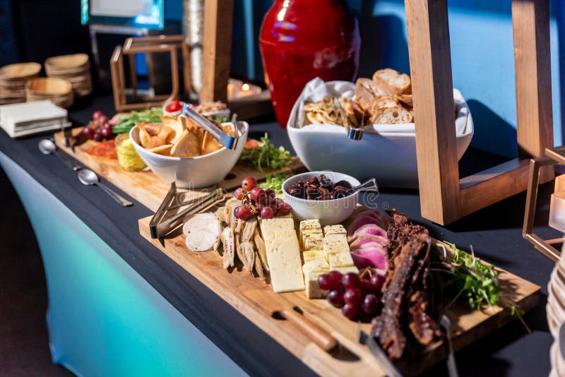 Closeup Shot of Buffet Appetizers on Wooden Boards Stock Photo - Image ...