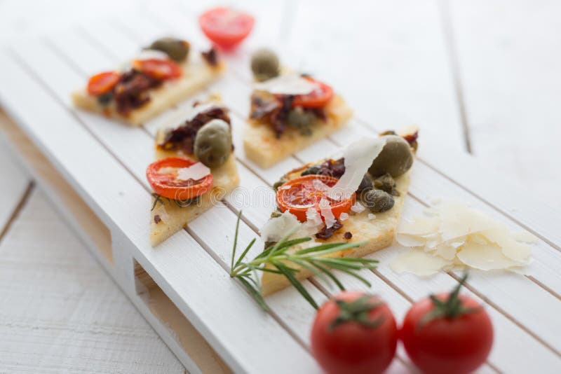 Closeup Shot of Buffet Bruschetta Snacks on a White Surface Stock Photo ...