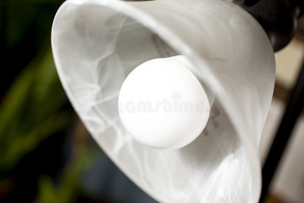 A light fixture and bulb editorial photography. Image of illumination ...