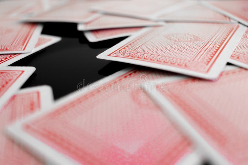 Closeup Shot of a Bunch of Red Playing Cards on a Black Surface Stock ...