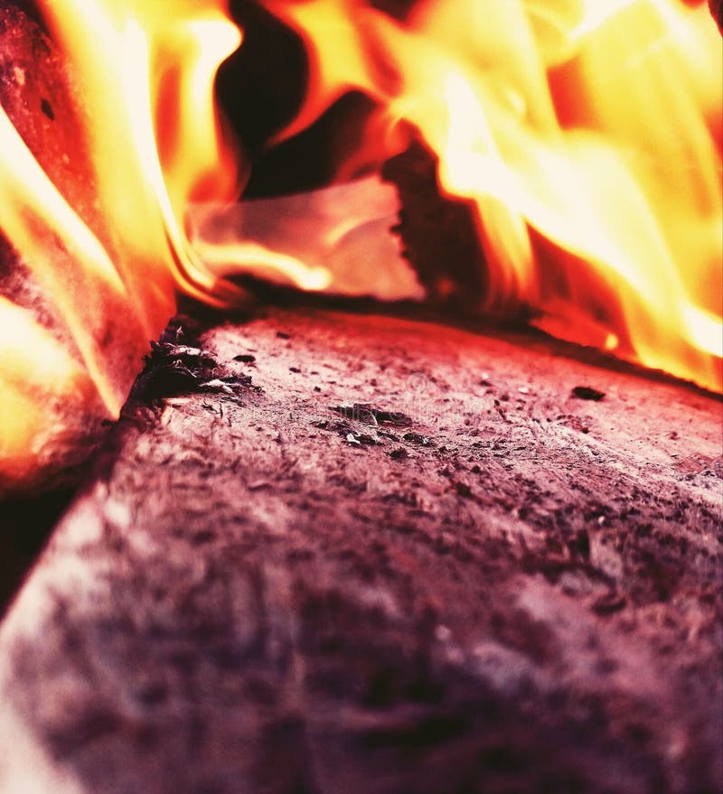Closeup Shot of a Burning Wood Log, with Fire Flames Stock Photo ...