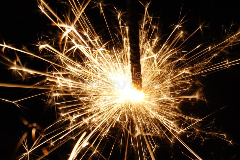Closeup Shot of Burst of Fire Sparks from Fireworks on Black Background ...