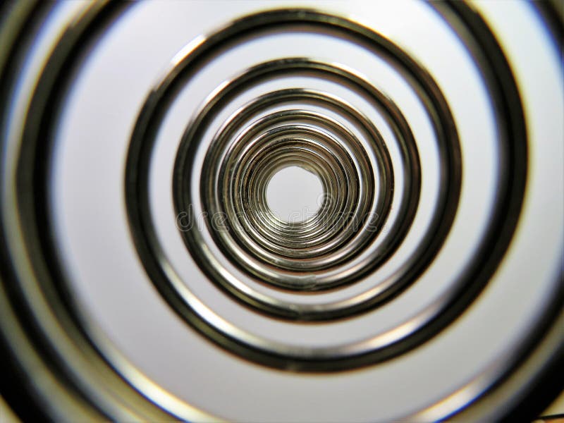 Coiled metal spring stock image. Image of rings, steel - 23001273