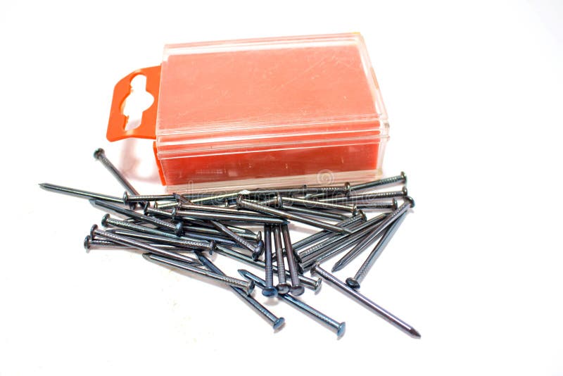 Closeup Shot of Common Nails Outside the Container Isolated on White ...