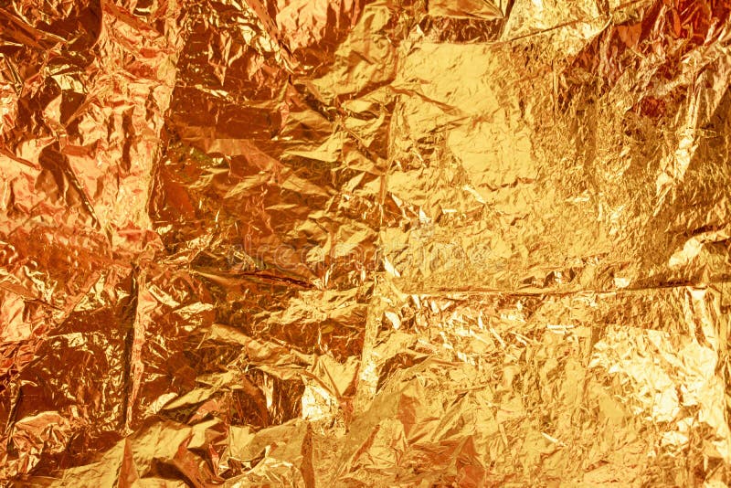 Closeup Shot of a Crumpled Golden Candy Wrapper Stock Photo - Image of ...