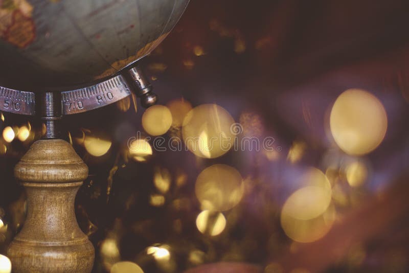 Closeup Shot of a Desk Globe with Blurred Lights in the Background ...