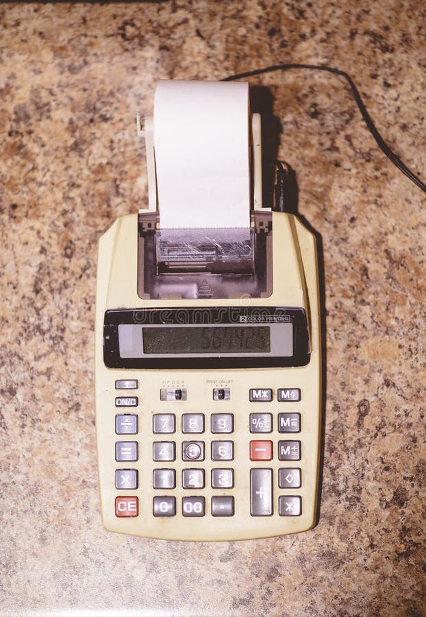 Closeup Shot of a Desktop Calculator with a Paper Tape Stock Photo ...