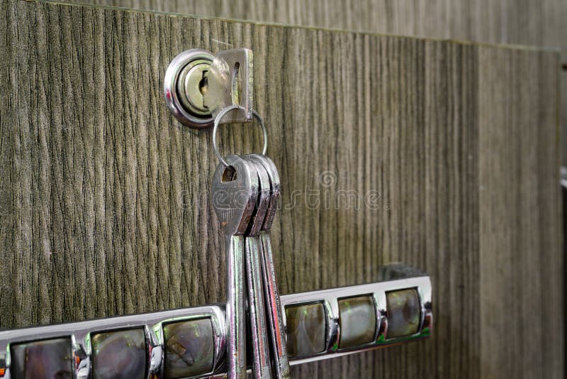 A Closeup Shot of a Drawer with a Small Lock and Keys Inside Stock ...