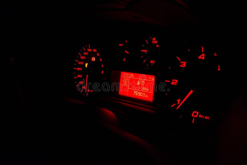 Closeup Shot of the Electronic Instrument Cluster in Red Lights in the ...