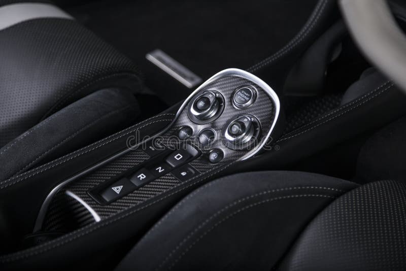 Closeup Shot of the Engine Start Buttons Inside a Modern Sport Car ...