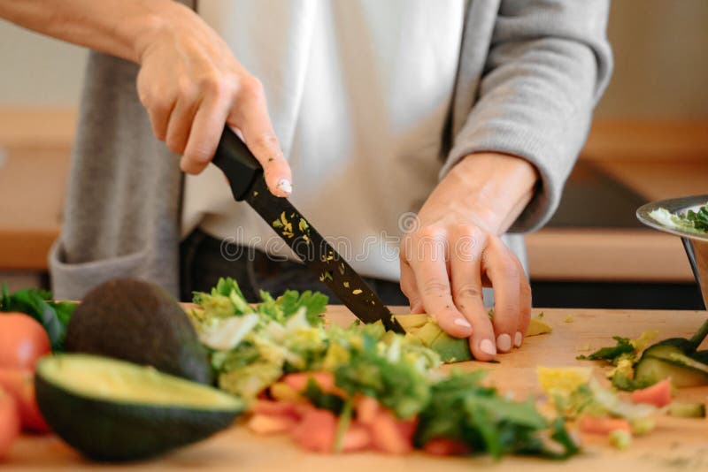Closeup Shot of a Female Cutting Vegetables Stock Photo - Image of ...