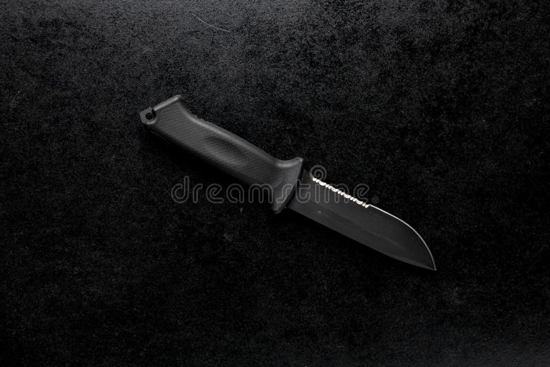Closeup Shot of a Fixed Sharp Knife on a Black Background Stock Image ...