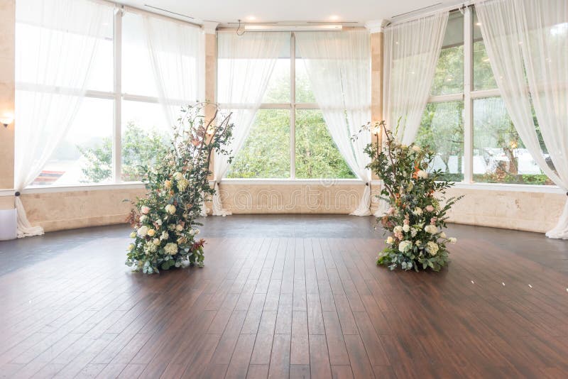 Closeup Shot of Floral Decorations in an Empty Wedding Venue with ...
