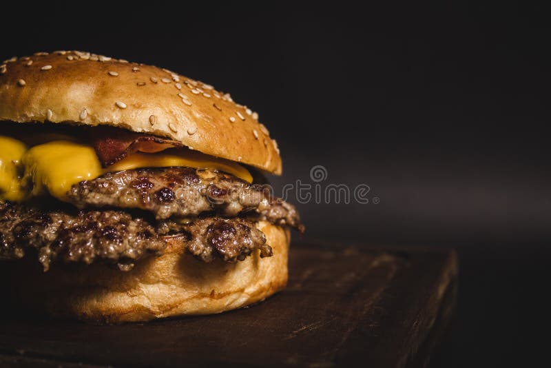 Closeup Shot of Fresh Delicious Burger on a Wooden Surface Stock Image ...