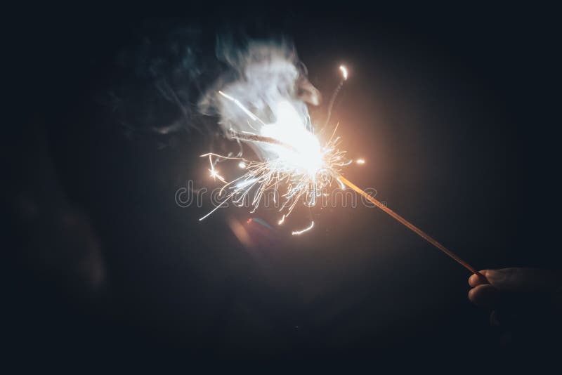 Closeup Shot of a Hand-held Firework Sparkler Stock Photo - Image of ...