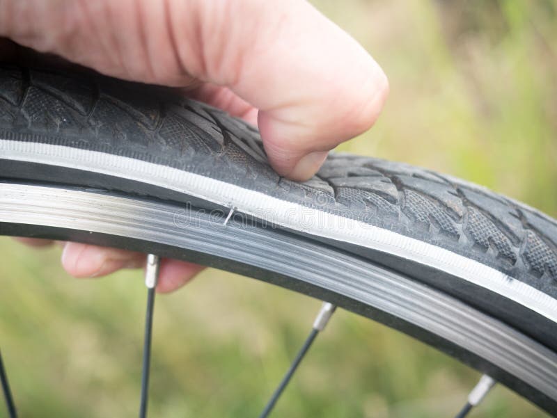 Closeup Shot of the Hand Pushing the Wheel of the Bicycle Stock Image ...