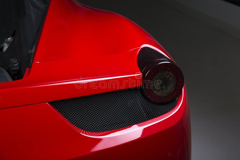 Closeup Shot Of The Headlights Of A Modern Red Car Stock Photo - Image ...