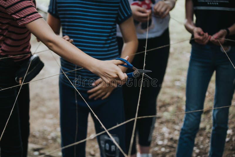 Closeup Shot of Human Hands Cutting a Rope with Sharp Scissors Stock ...