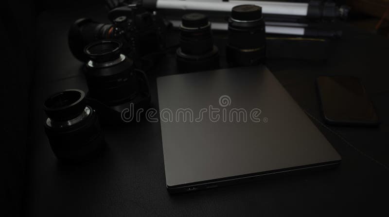 Closeup Shot of a Laptop with Camera Lens on a Table Stock Photo ...