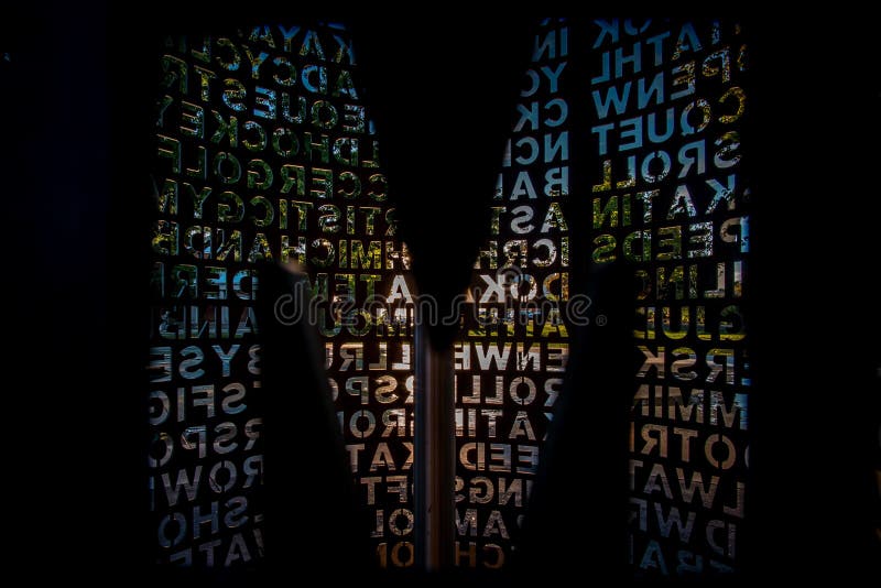 Closeup Shot of the Letter M Inside the Sculpture by a Fountain ...