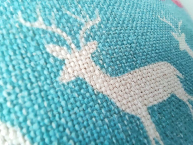 Closeup Shot of Light Blue Thread Texture with White Deer Stock Photo ...