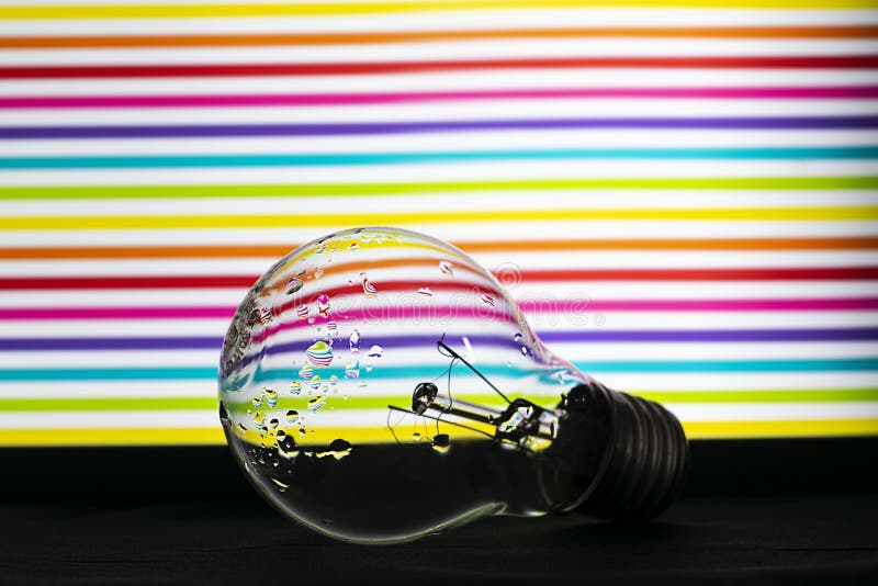Colorful Bulb Blue Water Drops Energy Symbol Stock Photos - Free ...