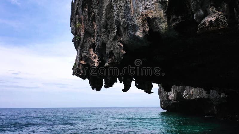 Closeup Shot of a Limestone Rock in the Middle of the Ocean in Koh Phi ...