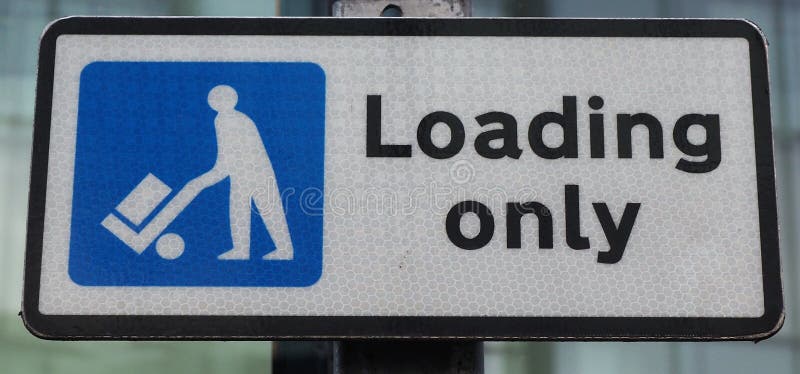 Closeup Shot of Loading Sign Road Stock Photo - Image of technology ...