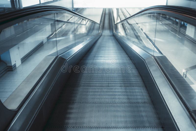 A Closeup Shot of a Long Moving Ramp Stock Photo - Image of electrical ...
