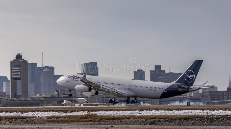 Closeup Shot of a Lufthansa Plane Landing on the Ground Editorial Photo ...